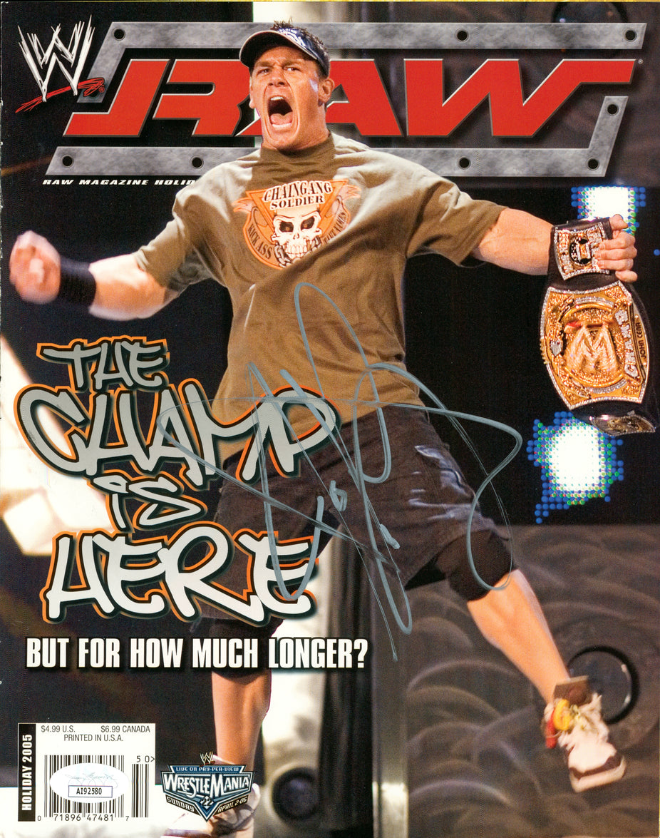 John Cena signed WWE Raw Magazine Cover (w/ JSA) – Signed By Superstars