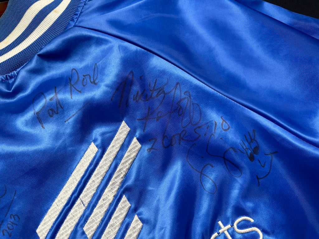 Multi-signed TBS Sports Jacket by NWA wrestlers (13 autographs ...