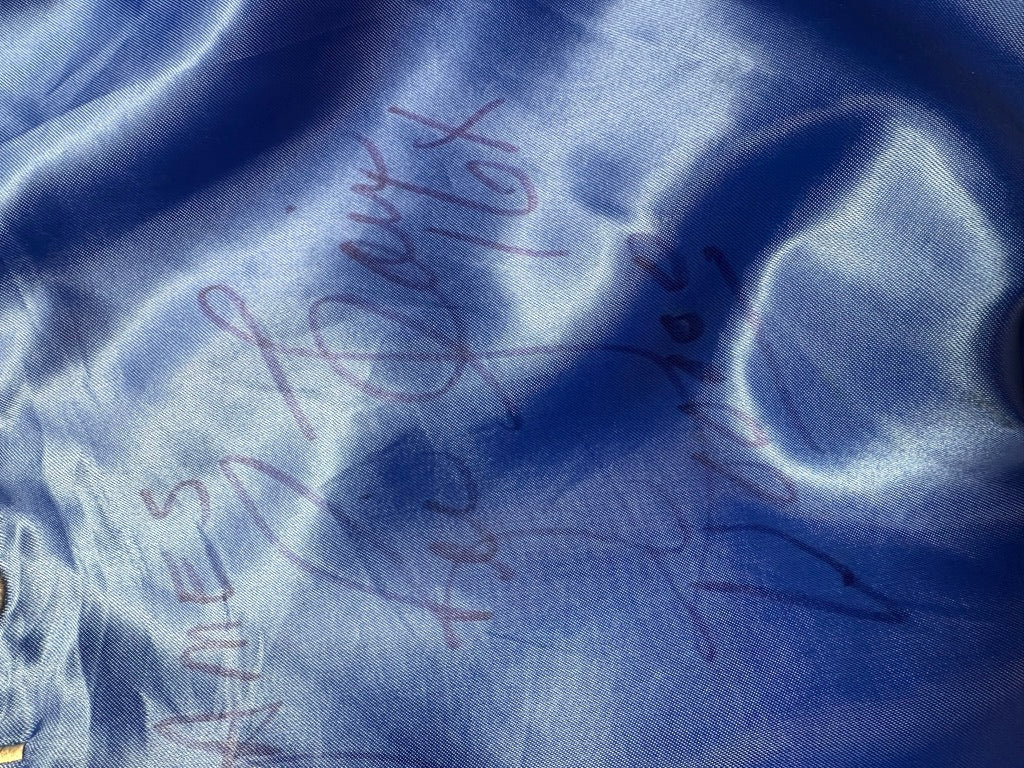 Multi-signed TBS Sports Jacket by NWA wrestlers (13 autographs ...